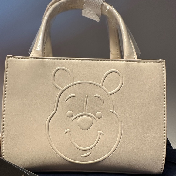 Loungefly | Bags | Loungefly White Mini Bag With Embossed Character ...